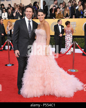 Angie Harmon and husband Jason Seahorn arriving for the 2010 Vanity ...