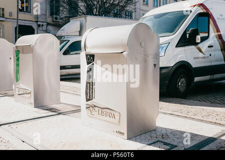 A modern smart trash can on the street in Krakow, Poland. Collection of ...