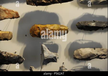 Axes for work and battle. Detail of core axes of the Maglemosian and ...