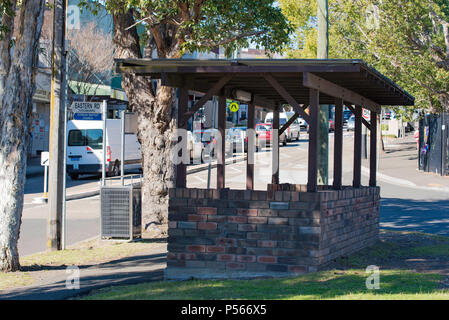 A clinker brick, timber and steel roof bus stop in Lindfield, Sydney ...