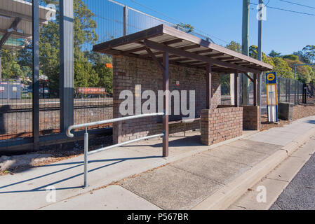 A clinker brick, timber and steel roof bus stop in Lindfield, Sydney ...