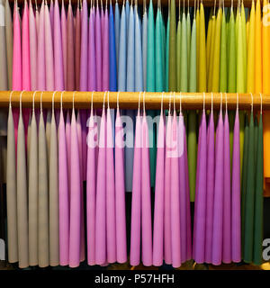 Manufacture and production of scented candles. Craft wax candle, top ...