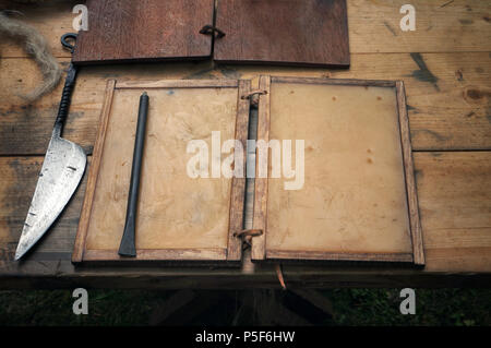 A Replica Roman Wax Writing Tablet with a Metal Stylus Stock Photo - Alamy