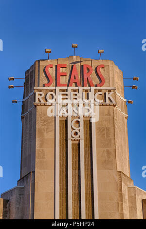 An old Sears Roebuck & Company store sign on a art deco facade Stock ...