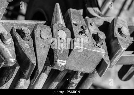 Historical tools of a blacksmith at a medieval market such as hammer ...