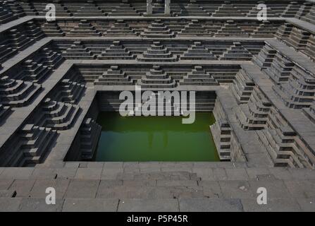 Ancient stepped water tank in front of the Sun Temple at Modhera ...