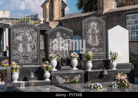 Roman Catholic cemetery with ornate carved marble and granite ...
