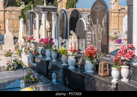 Roman Catholic cemetery with ornate carved marble and granite ...