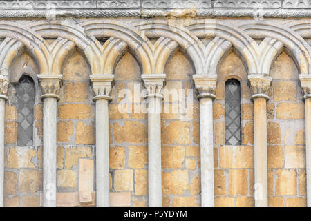 Decorated gothic stone arches on the west wall at the medieval ...