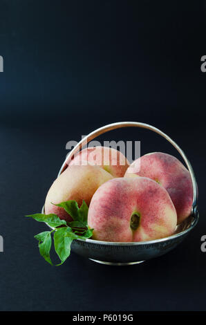 fig peach. saturn peaches. flat peaches harvest. many peaches. Fresh ...