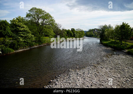 The river Derwent flowing through Cockermouth with low water level ...