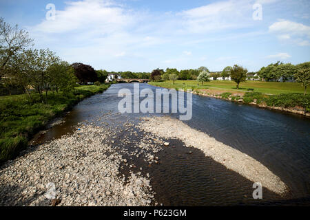 The river Derwent flowing through Cockermouth with low water level ...