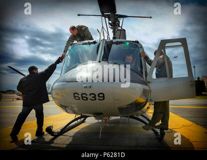 Col. Douglas DeLaMater, 374th Airlift Wing commander, plays with his ...