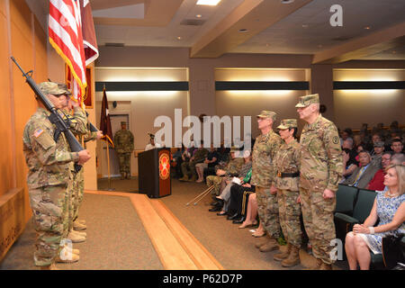 Col. Evan Renz, Brooke Army Medical Center commander, pins the Legion ...