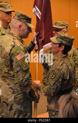 Col. Evan Renz, Brooke Army Medical Center commander, pins the Legion ...