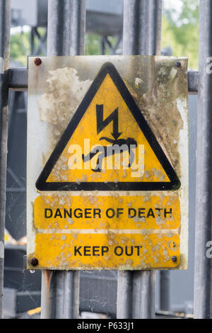 Danger of death and electrocution. Triangular electricity warning sign ...