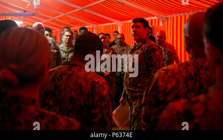 Capt. Kyle Moses, commodore of Commander, Task Force (CTF) 56, left ...