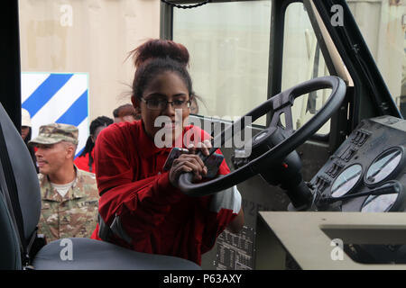 Army trucks with the Load Handling System Compatible Water Tank Rack ...