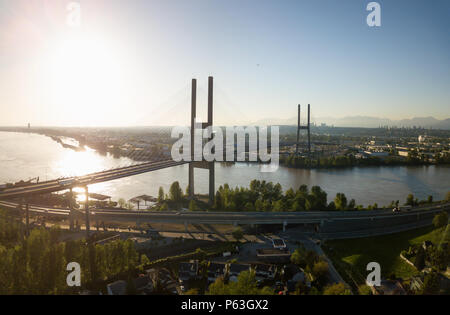 Aerial view of Alex Fraser Bridge during a vibrant sunny day. Taken in ...