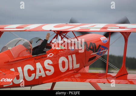 Michael Wiskus pilots the Lucas Oil Air Shows Pitts S1-11B biplane low ...
