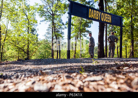 U.S. Army Rangers prepare to start the Darby Queen obstacle course ...