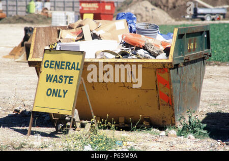 Waste skips on site with sorted types of waste Stock Photo - Alamy