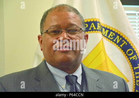 Michael Williams, Army Logistics University president, hands the ...