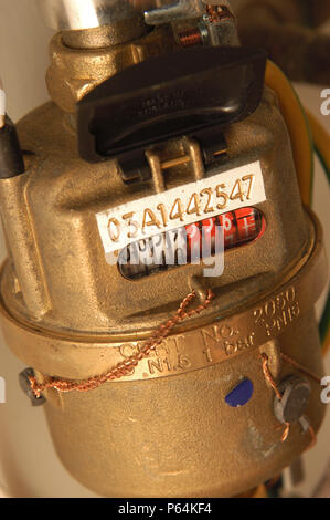 A domestic water meter in a cupboard Stock Photo - Alamy