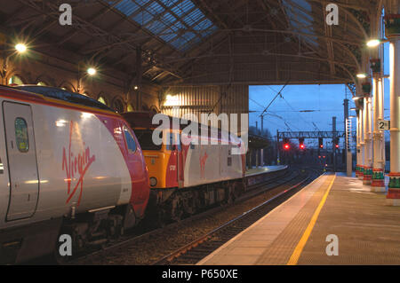 A Virgin Class 57/3 Thunderbird diesel locomotive hauls a Pendolino ...
