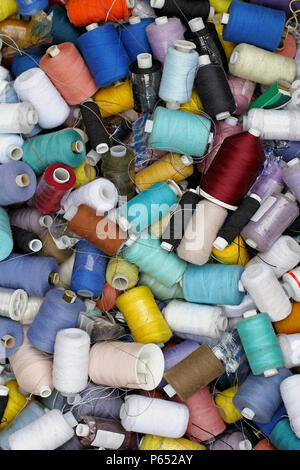 Bunch of thread spools in various color Stock Photo - Alamy