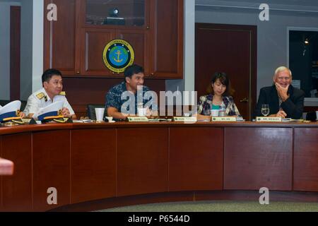 Vietnamese People's Navy Rear Adm. Do Viet Cuong, center, and Capt. Nguyen Trong Binh Stock ...