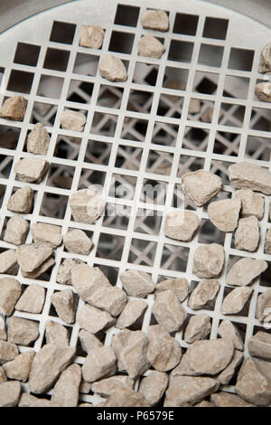 Sieves showing the different size materials from a test sample ...