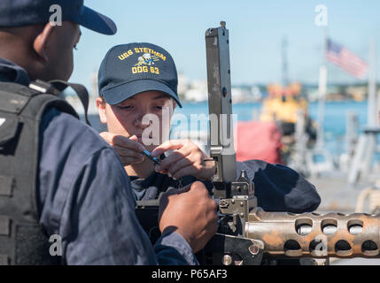 A Browning M2HB .50 caliber machine gun sits on a Riverine Command Boat ...