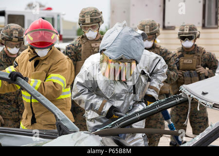 Spanish firefighters with Morón Fire Department observe U.S. Marine ...