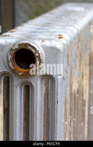 Cast iron radiators in salvage yard Stock Photo - Alamy