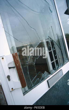 smashed broken double glazed window facing main road as a result of ...