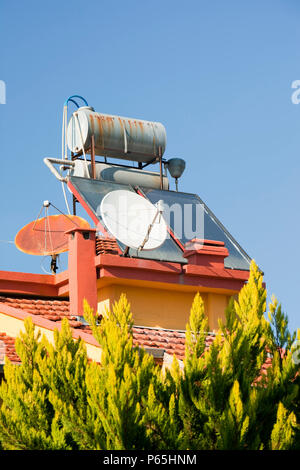 Solar water heaters on houses in Teos, in Western Turkey Stock Photo ...
