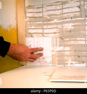 Tiling in progress Stock Photo - Alamy
