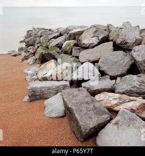 New stone groyne for coastal protection Stock Photo - Alamy
