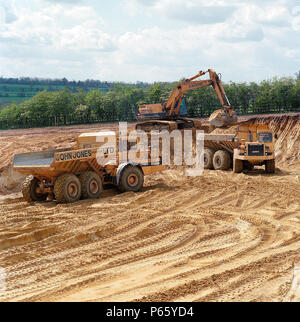 Caterpillar D400D articulated dumper truck and Komatsu crawler ...