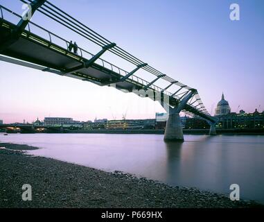 The Millenium Bridge, designed by architect Norman Foster links St Paul ...