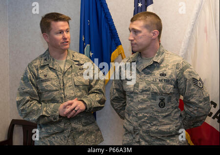 Colonel Christopher Maddox, commander, 60th Operations Group, and Chief ...
