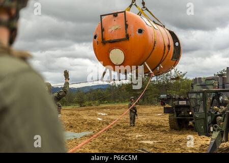 Heavy equipment operators with Headquarters and Support Company, Combat ...