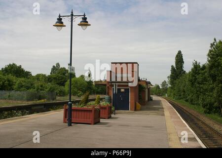 General view of the platform, floral tubs and platform lighting at ...