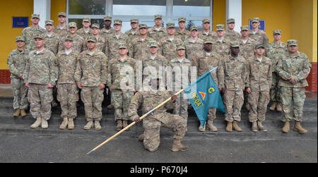 U.S. Army Soldiers pose with their Basic Leader Course certificate ...