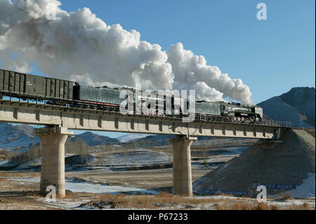 A pair of QJ Class 2-10-2s in the steam testing shed at Datong ...