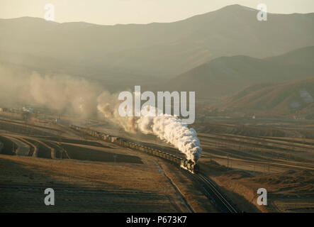 A pair of QJ Class 2-10-2s in the steam testing shed at Datong ...