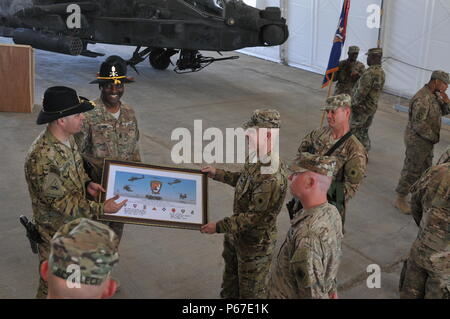 Lt. Col. RJ Garcia, left, and Command Sgt. Maj. Terri Clavon, right ...