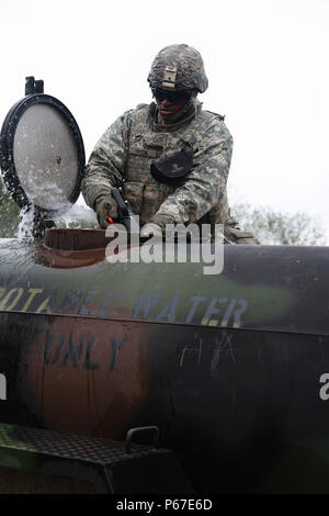 Soldiers from 240th Quartermaster Support Company, 18th Combat Support ...