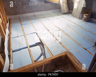 Floorboard insulation with polystyrene sheets and underfloor heating ...